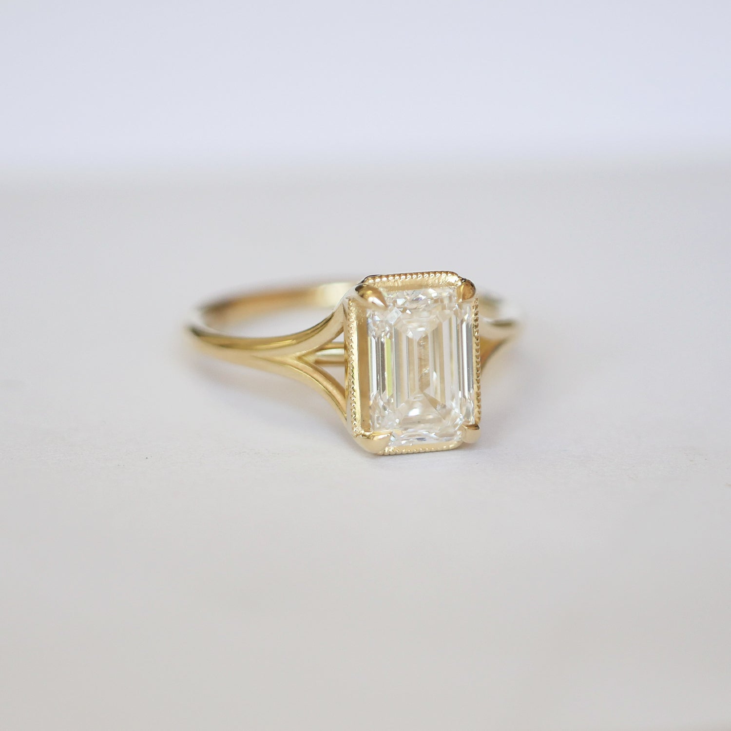 Split Shank Emerald Cut Diamond Solitaire | Berlinger Jewelry